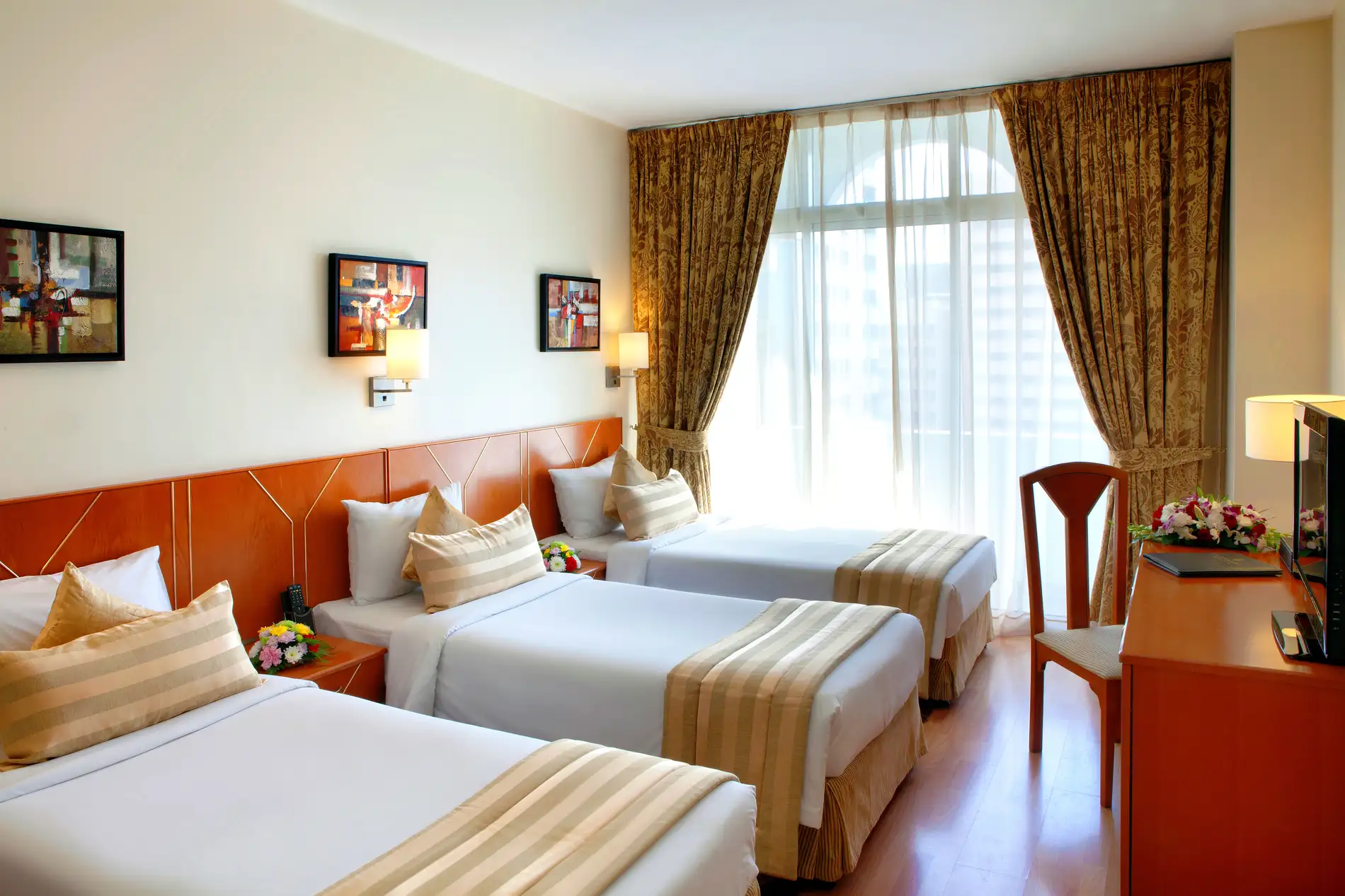 Classic Triple Beds Room at Landmark Grand Hotels